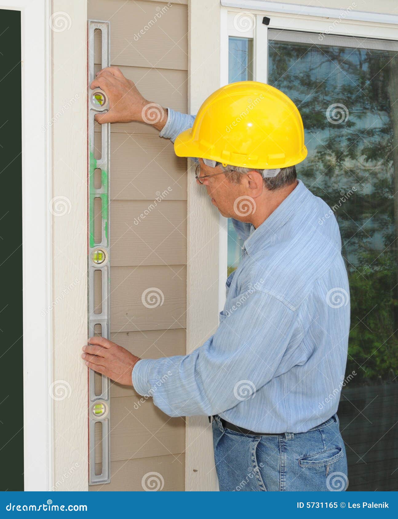 Construction Worker Installing a Window Frame Stock Image - Image of ...