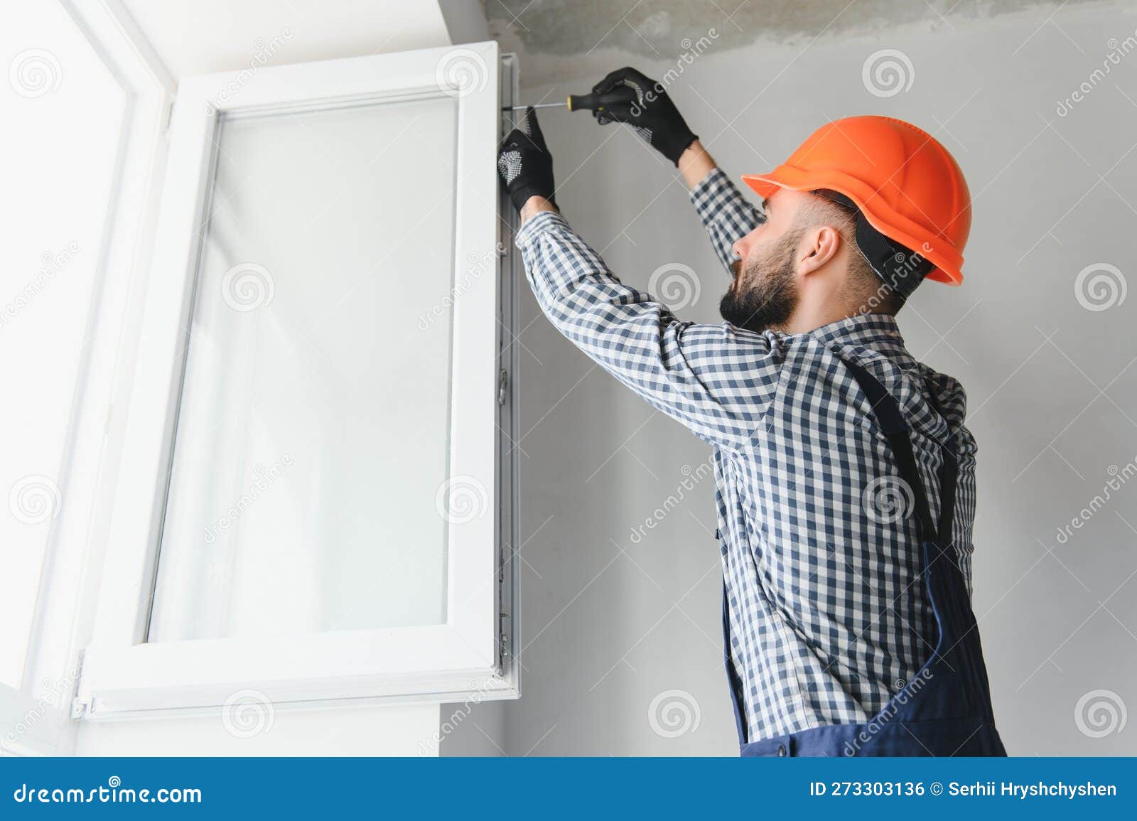 Construction Worker Installing Window in House Stock Photo - Image of ...