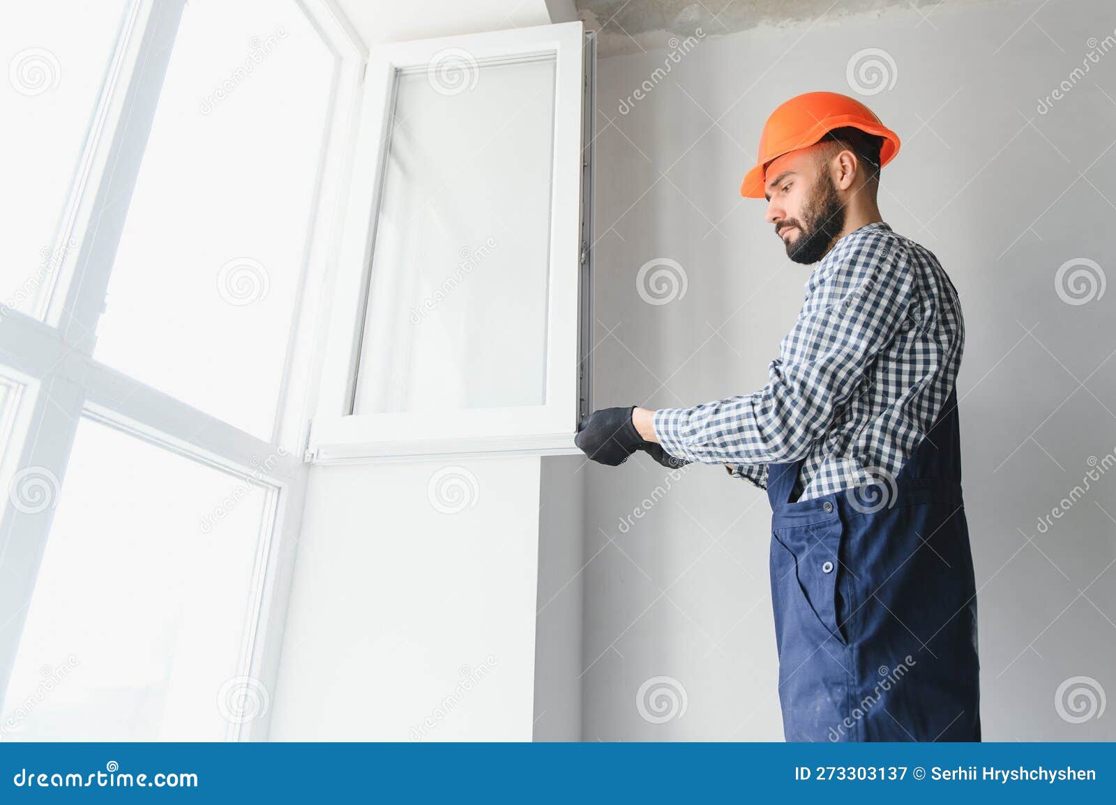 Construction Worker Installing Window in House Stock Image - Image of ...