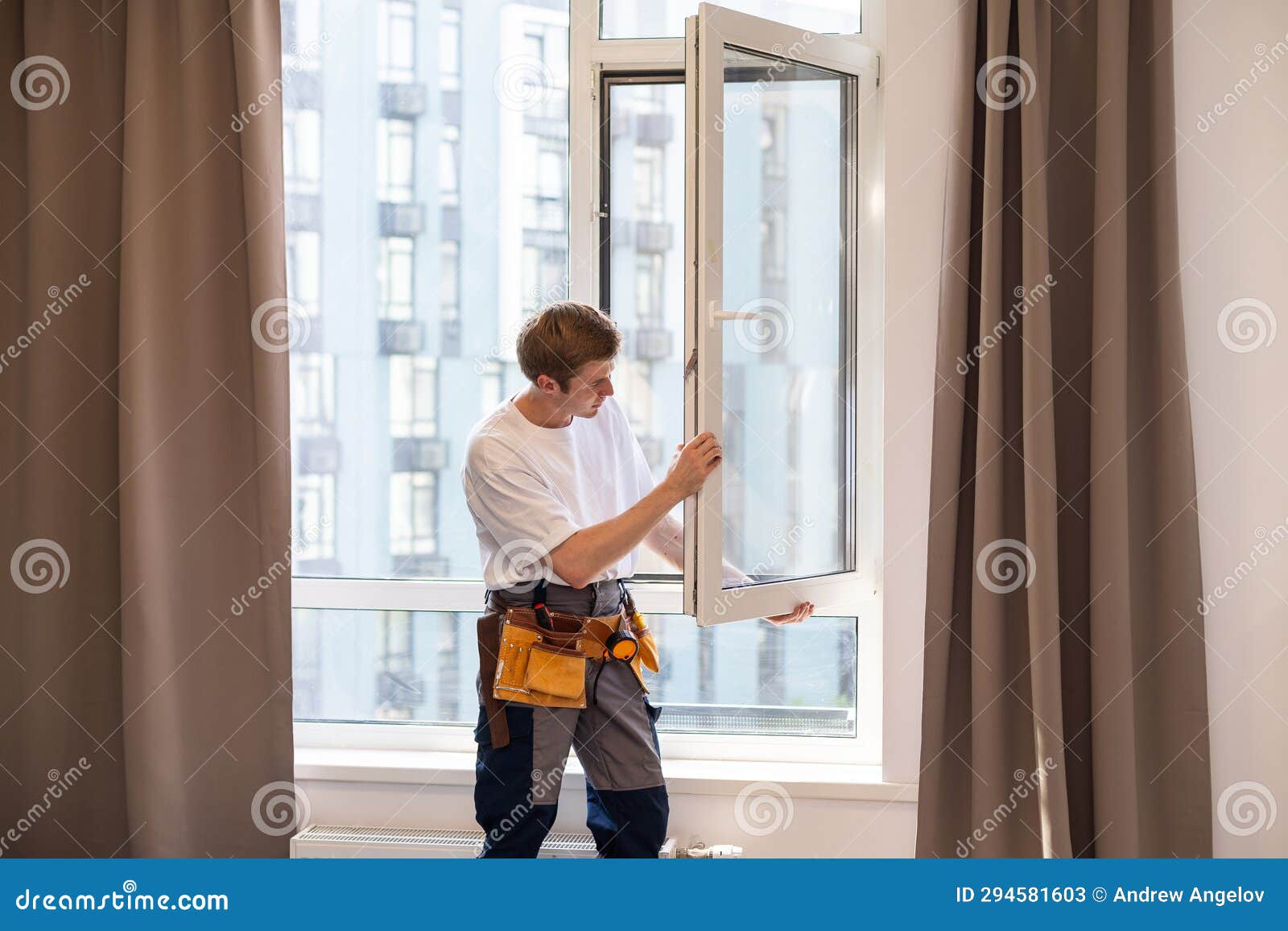 Construction Worker Installing Window in House Stock Image - Image of ...