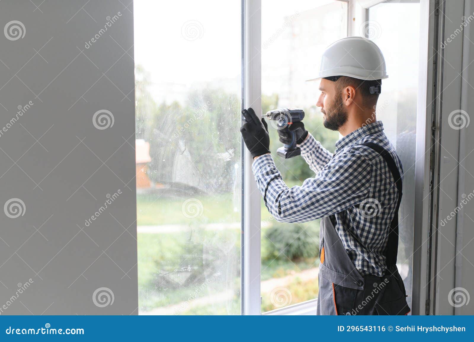 Construction Worker Installing Window in House. Stock Photo - Image of ...
