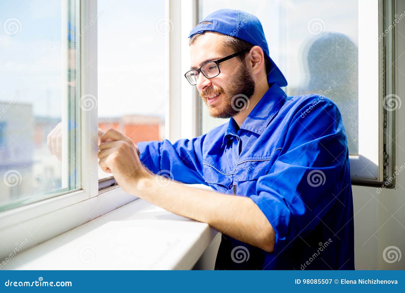 Construction Worker Installing Window Stock Image - Image of builder ...