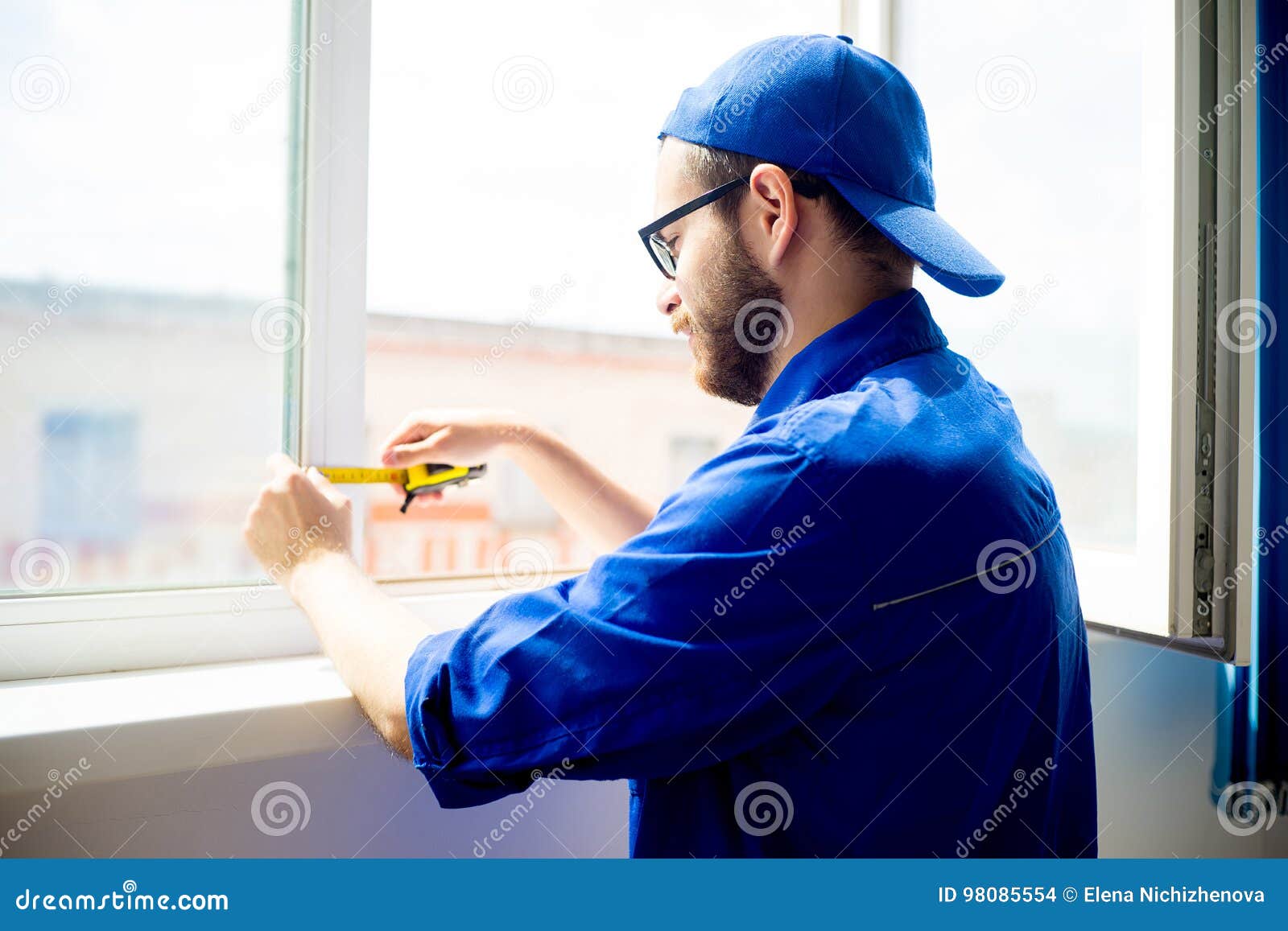 Construction Worker Installing Window Stock Photo - Image of handyman ...