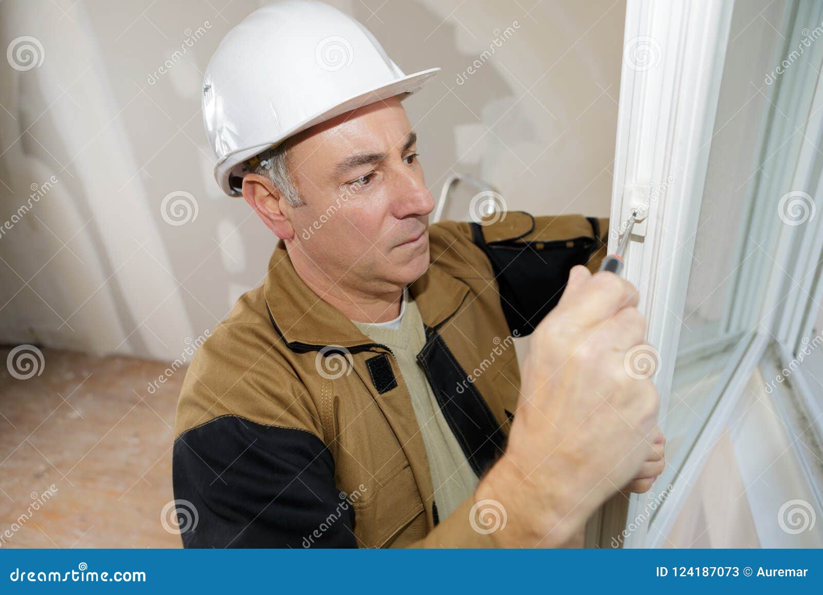 Construction Worker Installing Window in House Stock Image - Image of ...
