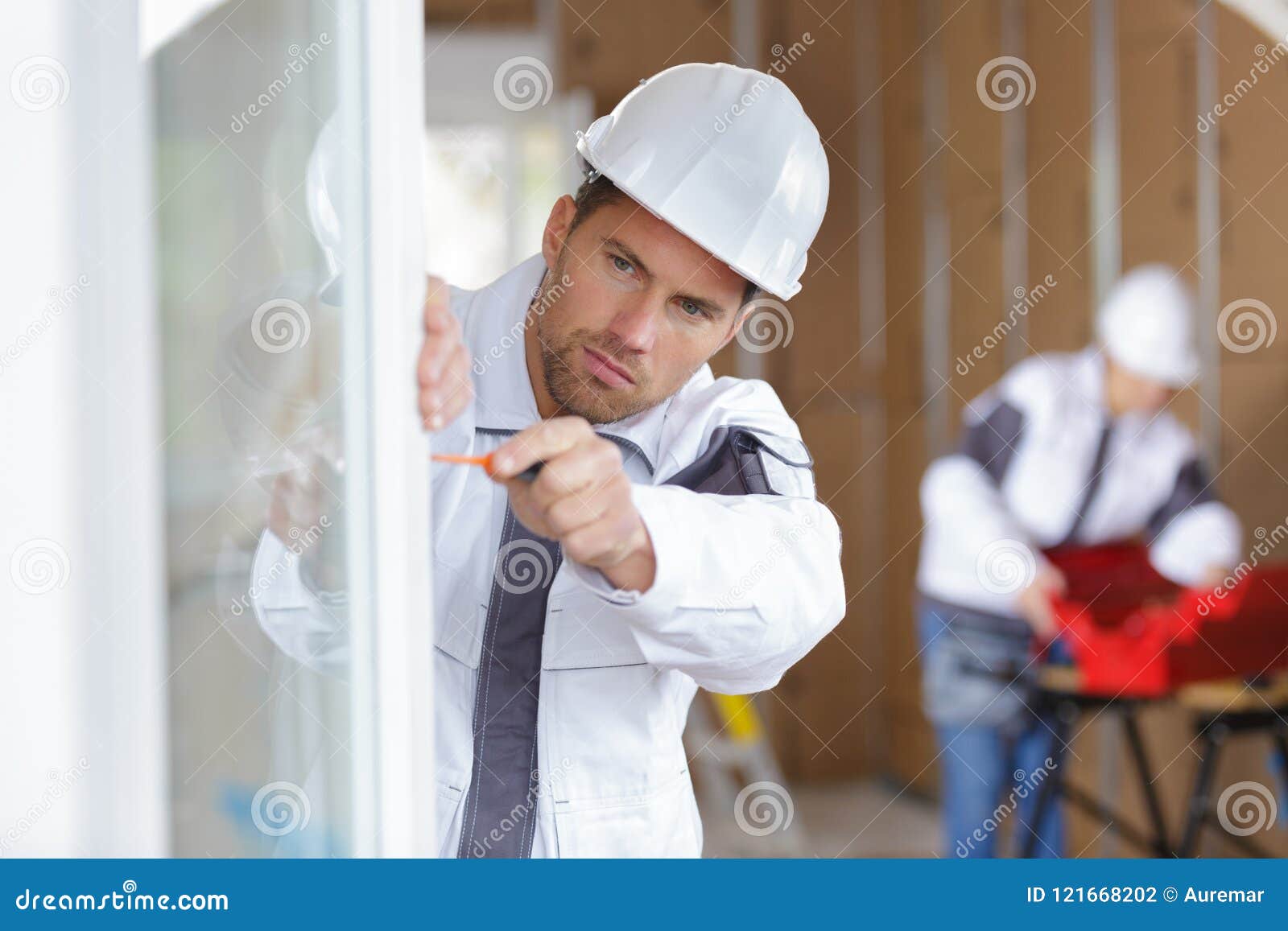 Construction Worker Installing Window in House Stock Photo - Image of ... Construction Worker Installing Window in House Stock Photo - Image of ...