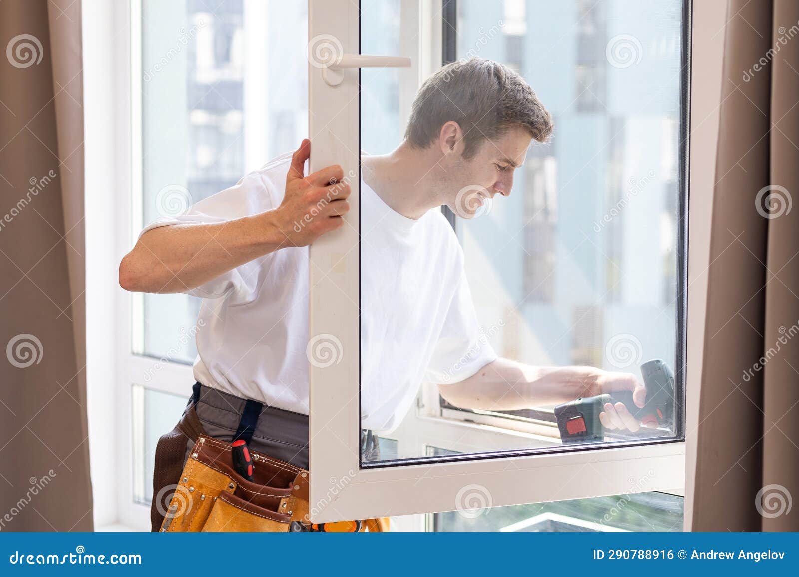 Construction Worker Installing Window in House Stock Photo - Image of ...