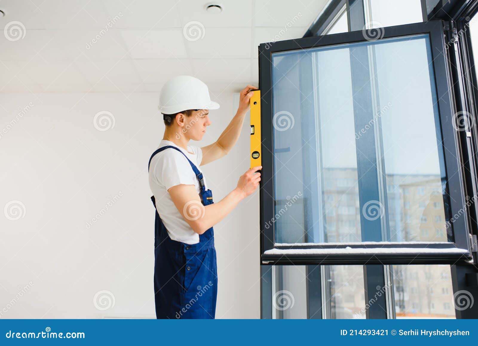 Construction Worker Installing Window in House Stock Image - Image of ...