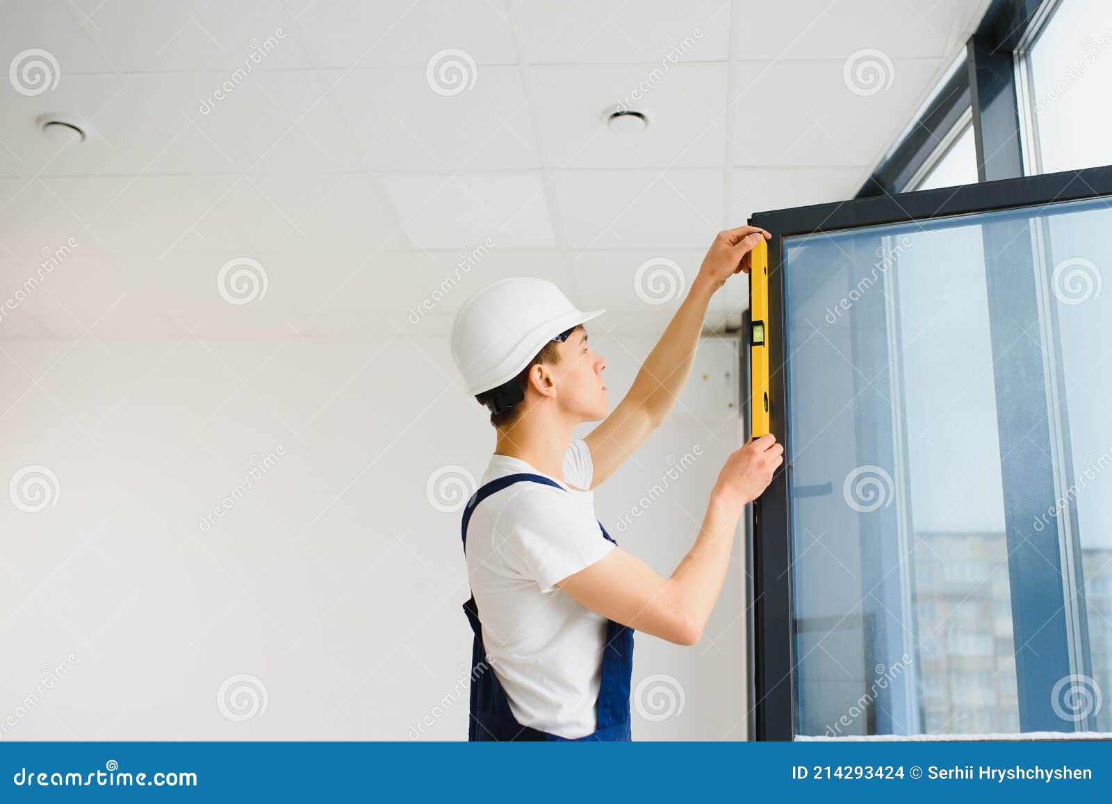 Construction Worker Installing Window in House Stock Photo - Image of ...