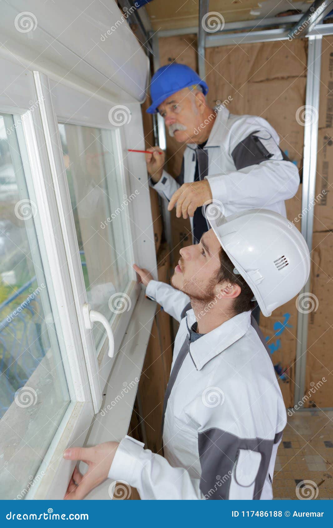 Construction Worker Installing Window in House Stock Photo - Image of ... Construction Worker Installing Window in House Stock Photo - Image of ...
