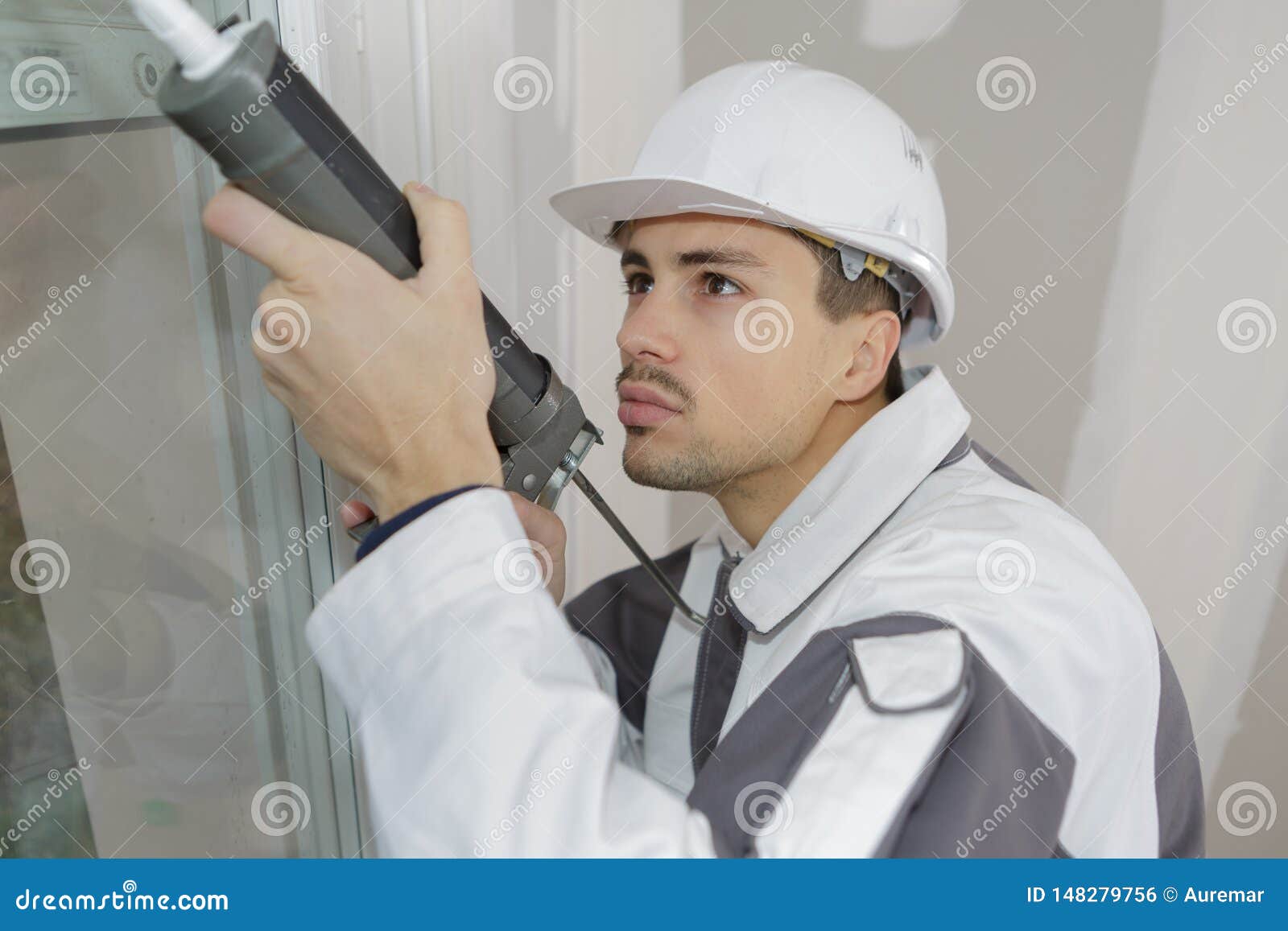 Construction Worker Installing Window in House Stock Photo - Image of ...