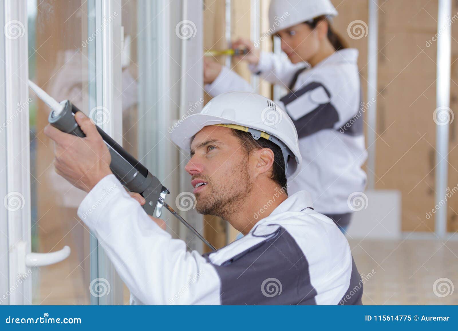 Construction Worker Installing Window in House Stock Image - Image of ...