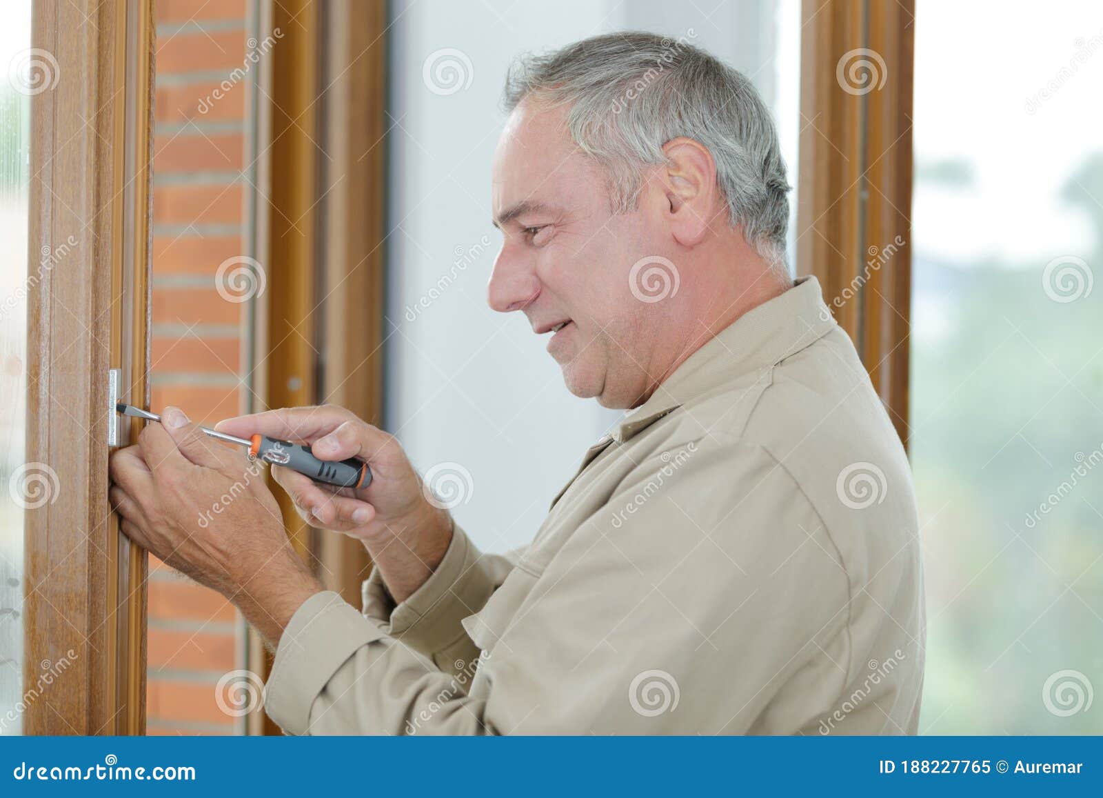 Construction Worker Installing Window in House Stock Image - Image of ...