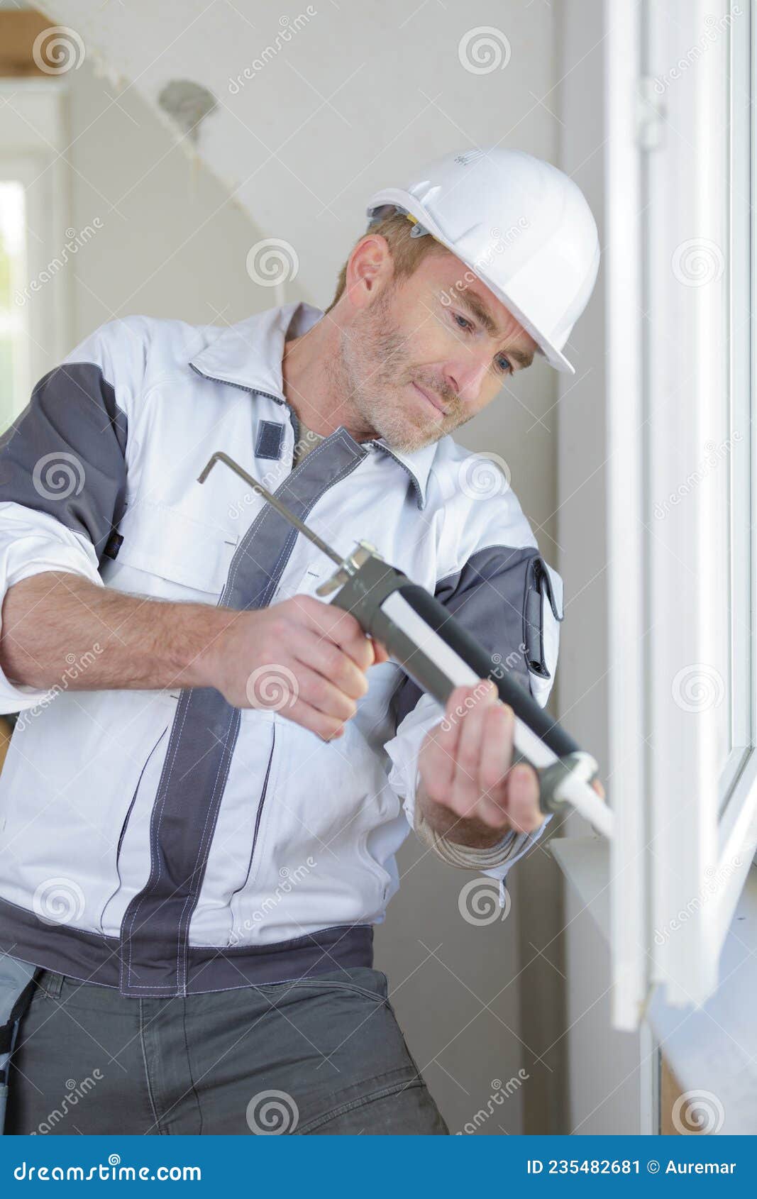 Construction Worker Installing Window in House Stock Image - Image of ...