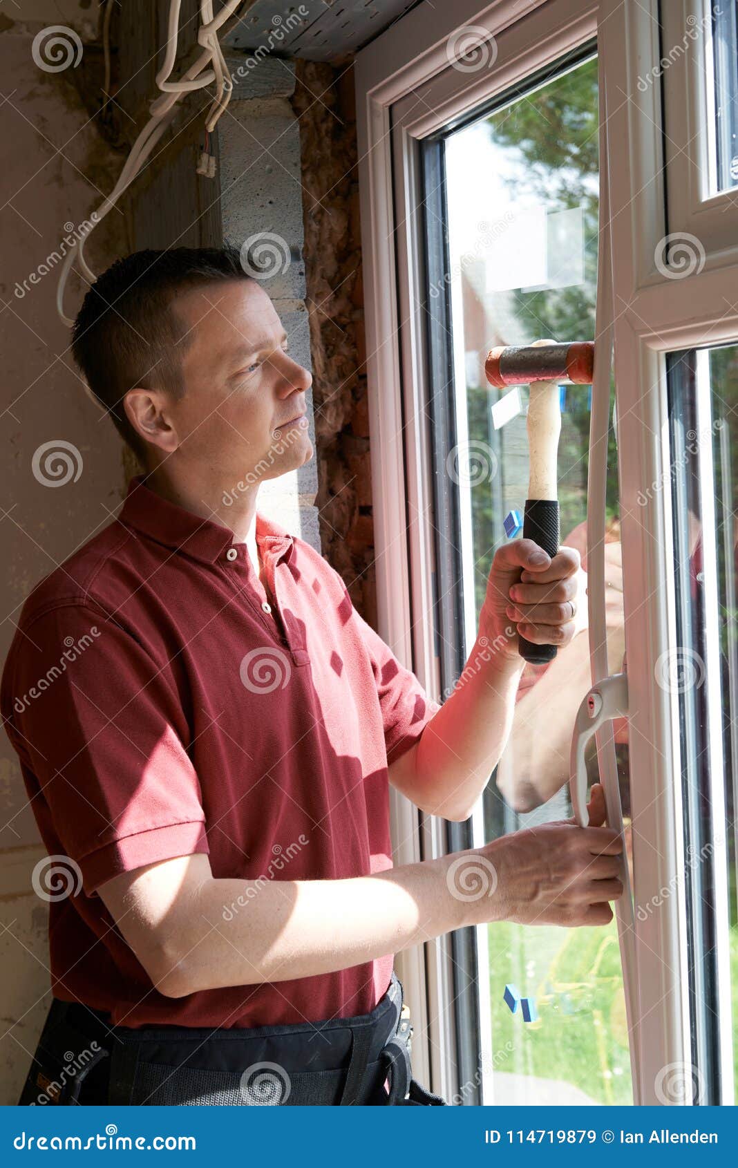 Construction Worker Installing New Windows in House Stock Image - Image ...