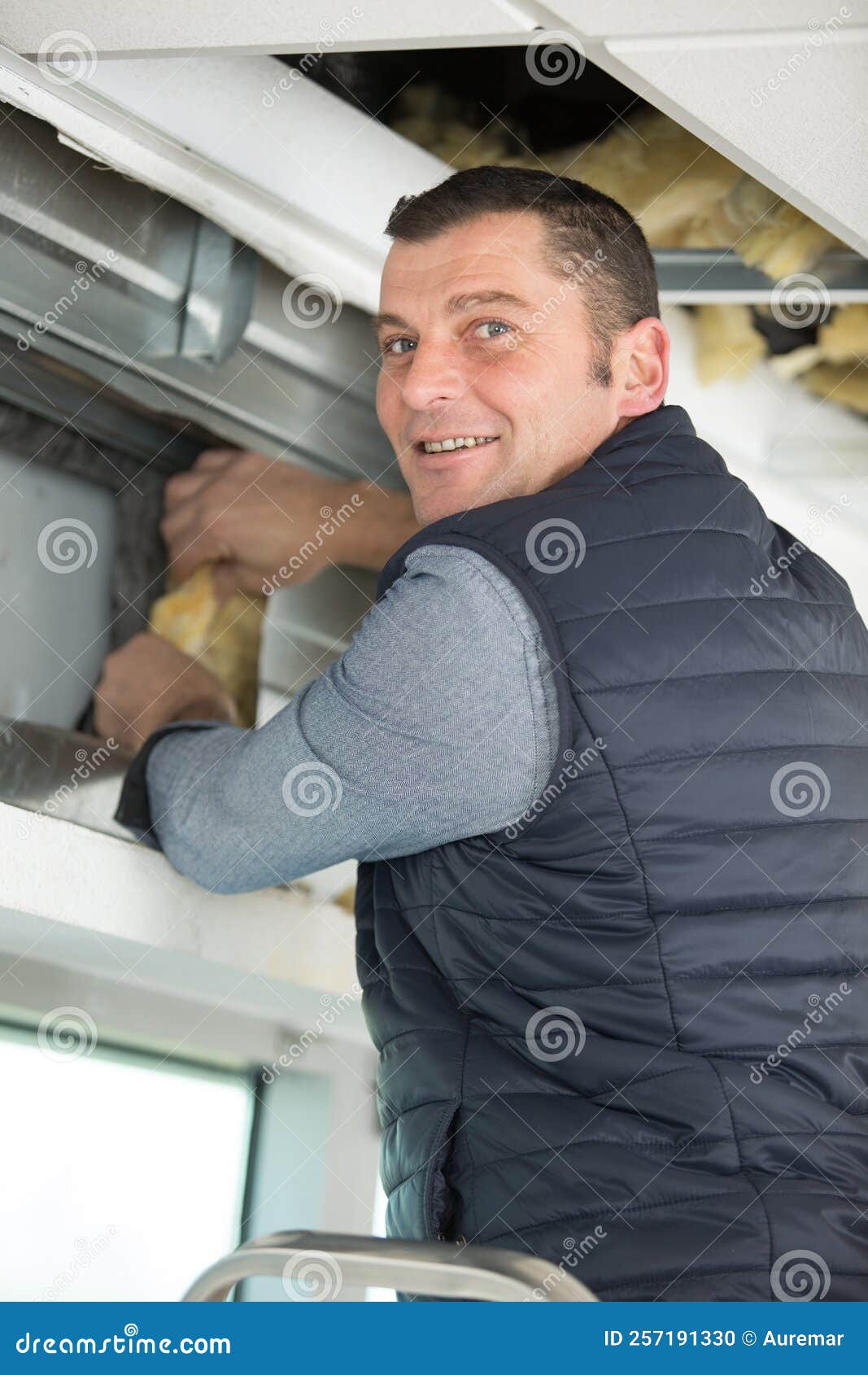 Construction Worker Insulating Plaster Wall with Glass Wool Stock Photo ...