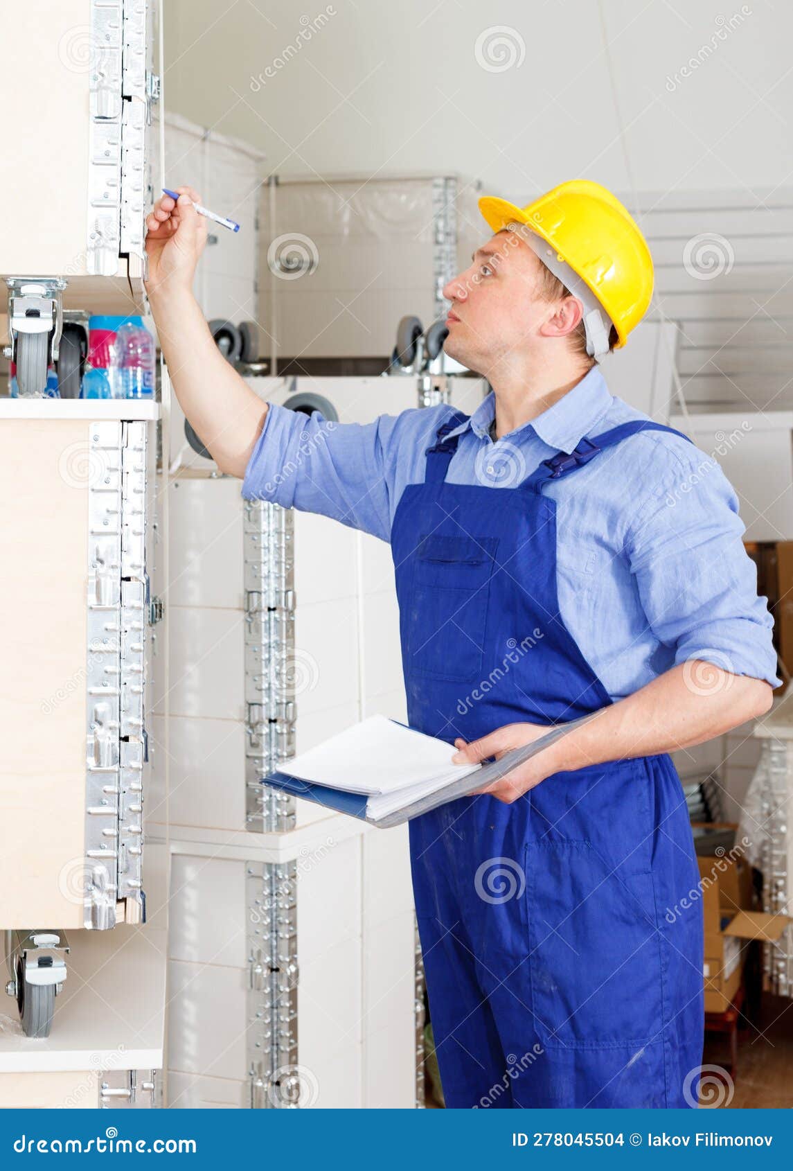 Construction Worker Inventorying Tools and Materials Stock Photo ...