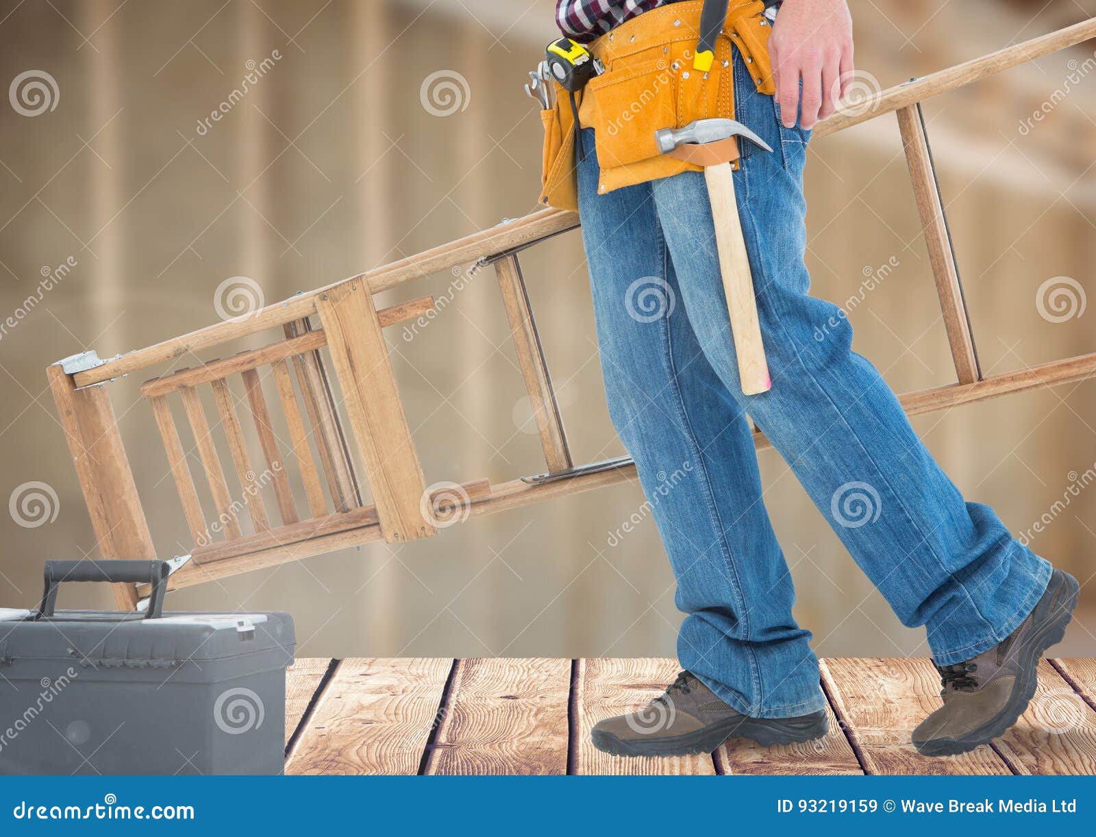 Construction Worker with Ladder in Front of Construction Site Stock ...