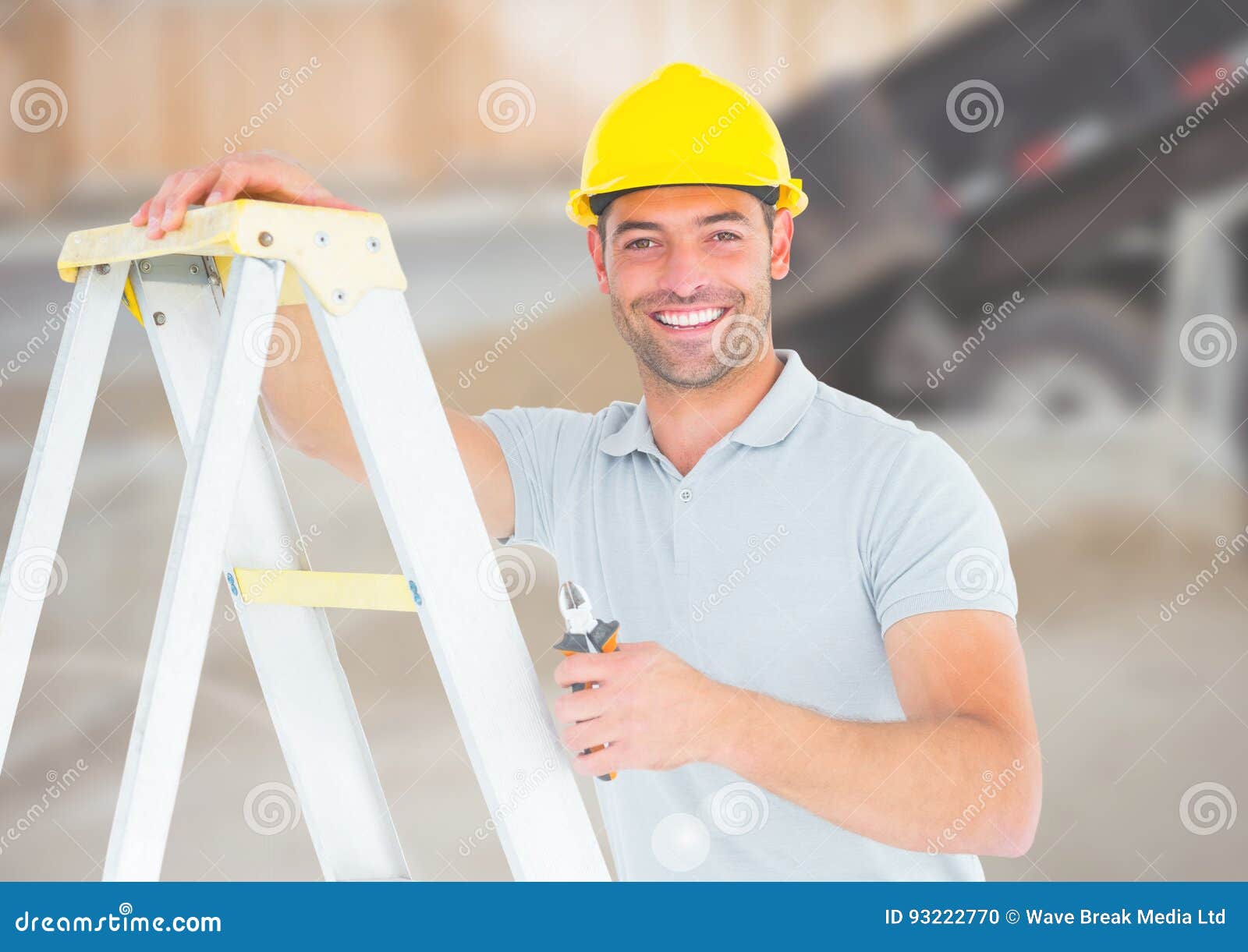 Construction Worker with Ladder in Front of Construction Site Stock ...