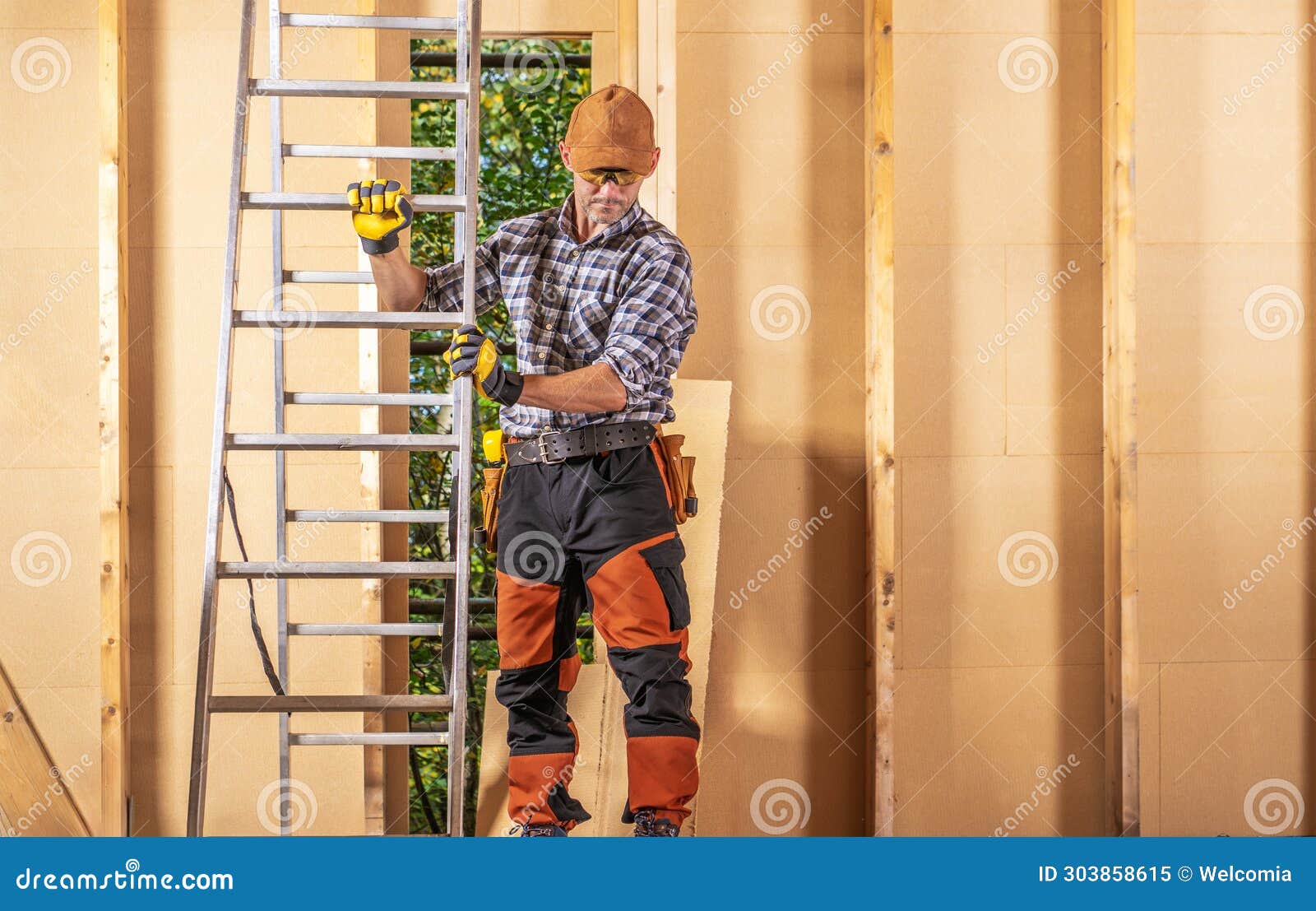 Construction Worker with a Ladder in His Hands Stock Image - Image of ...