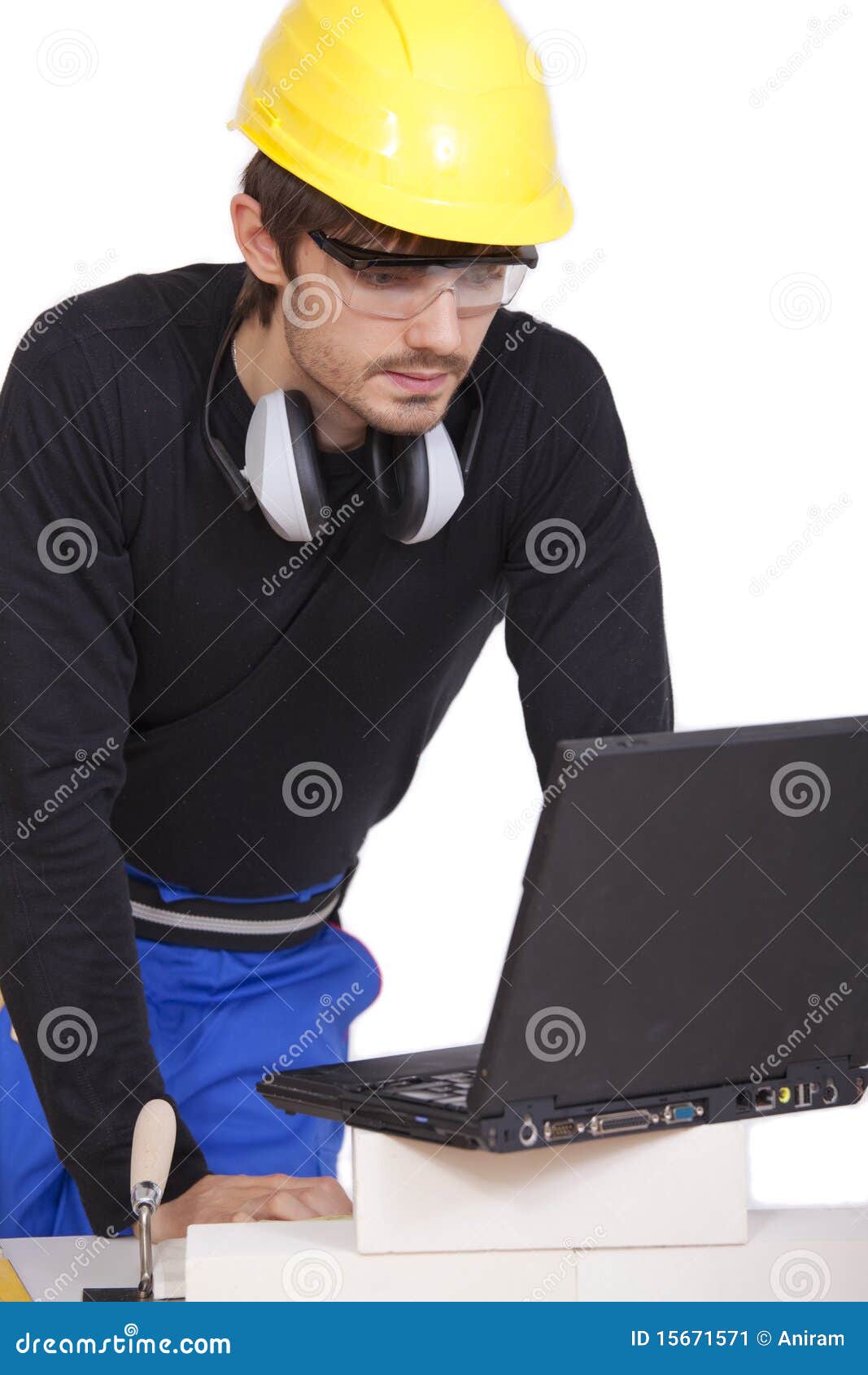 Construction Worker with Laptop Stock Image - Image of looking ...