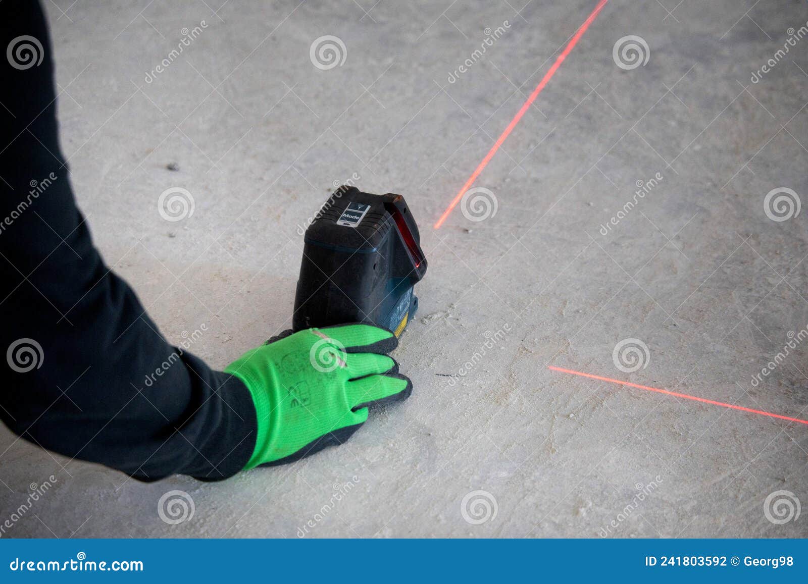 Construction Worker with Laser Device Stock Photo - Image of laser ...