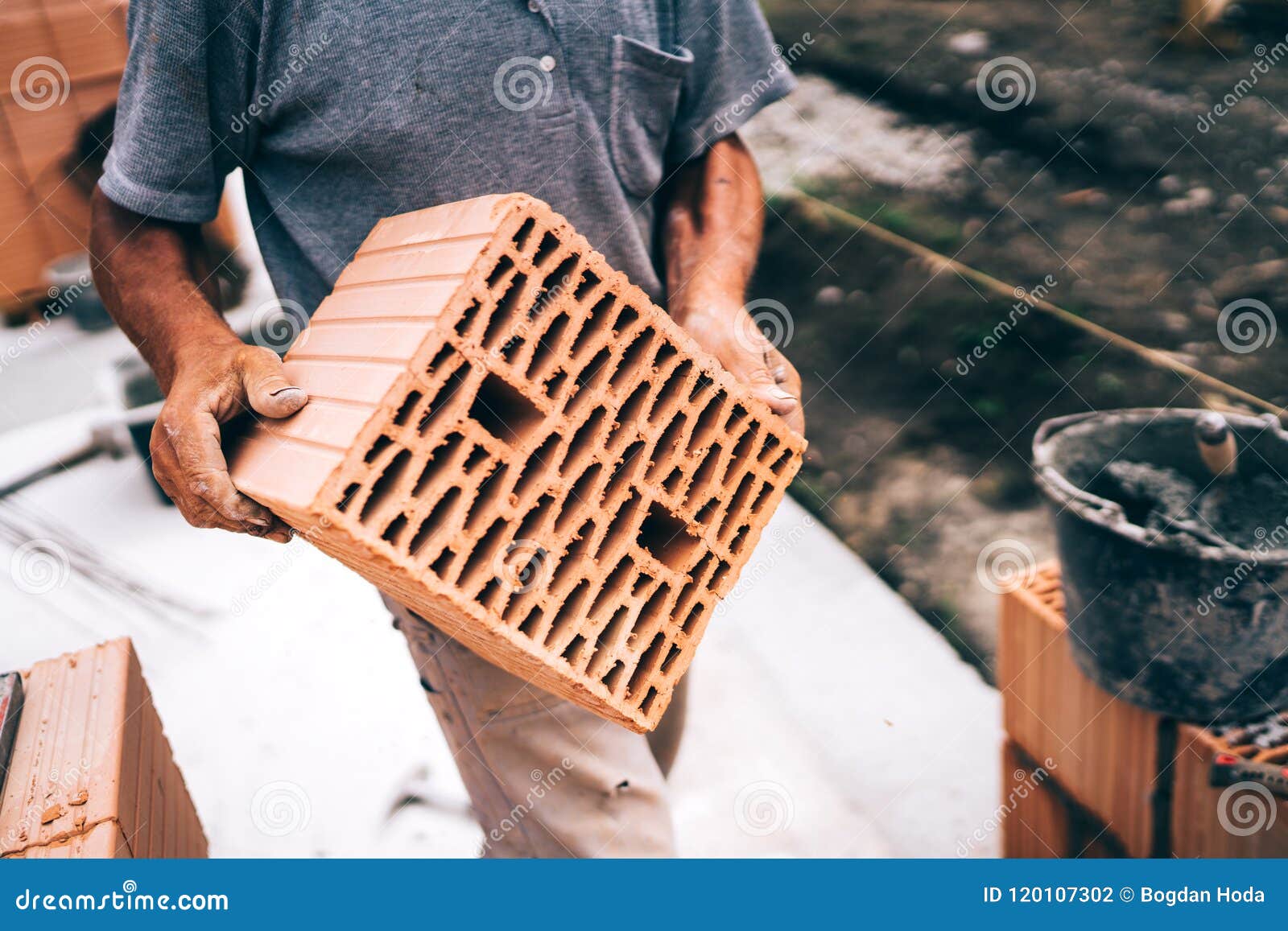 Construction Worker Laying Bricks on Walls, Carrying and Moving Around ...