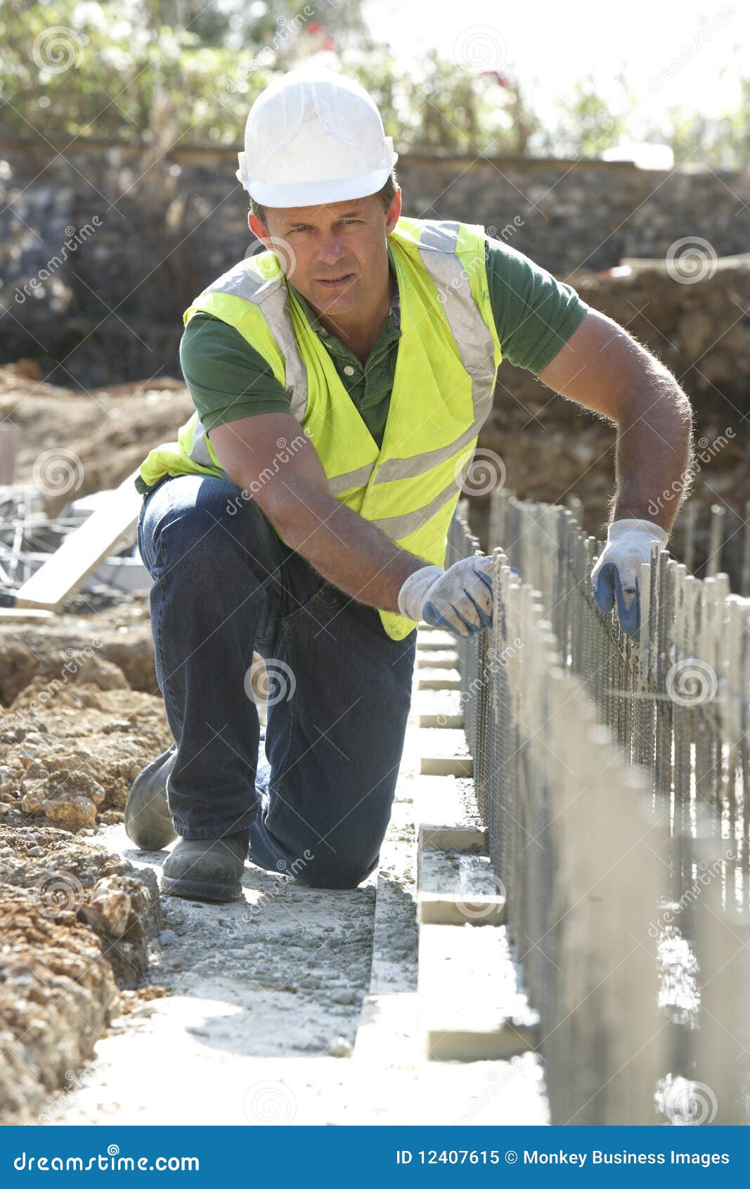 A Worker Laying Red Concrete Paving Blocks. Lay Paving Stones Stock ...