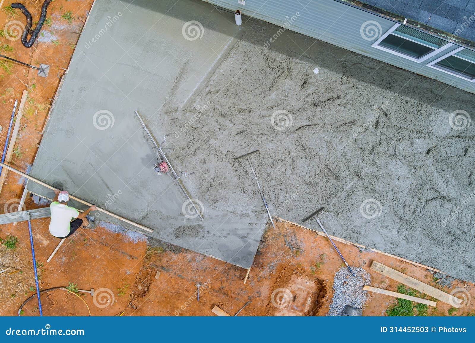 Construction Worker Leveling of Concrete by Using a Special Tools Stock ...