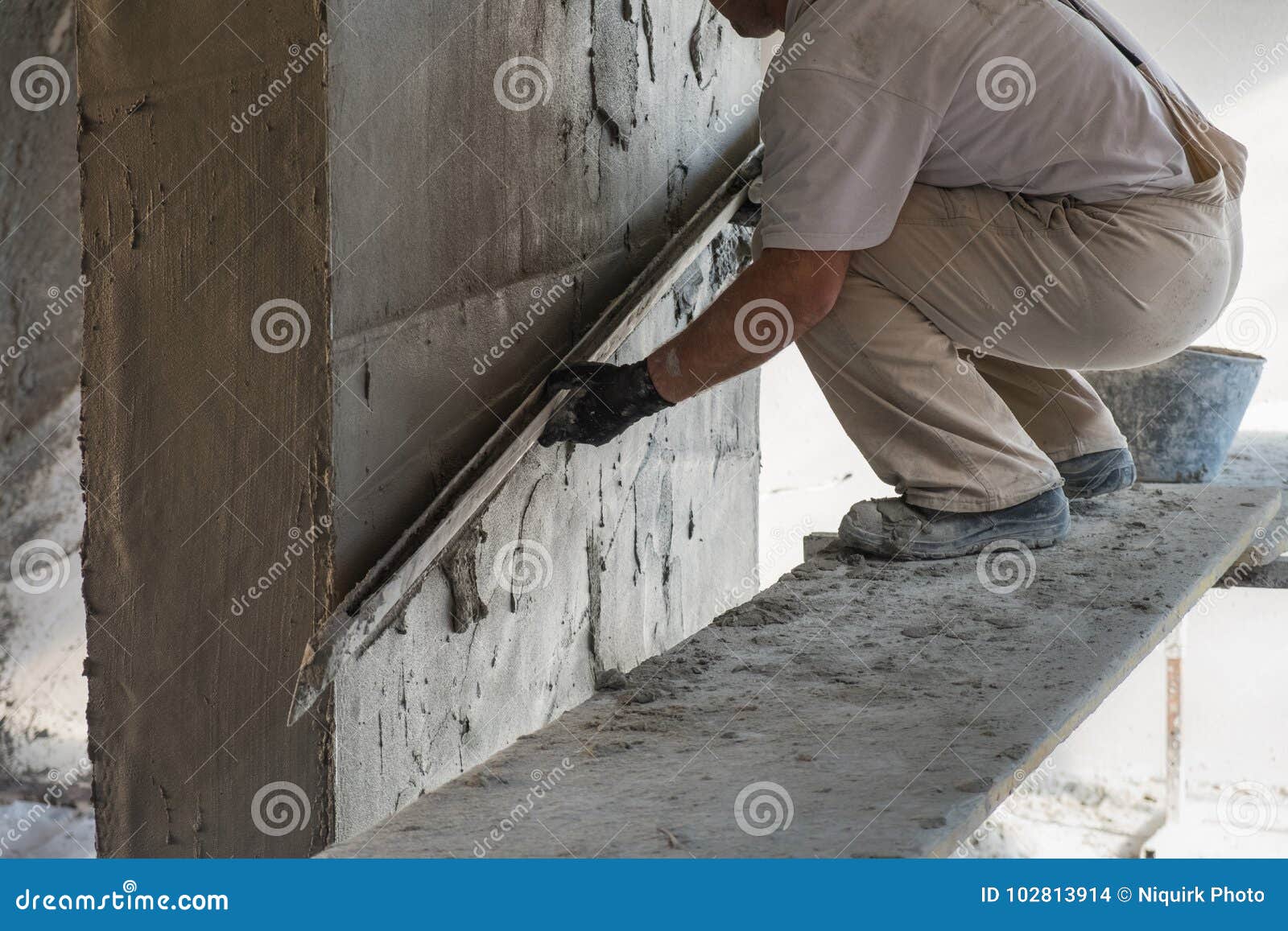 Construction Worker Leveling the Wall Stock Photo - Image of home ...