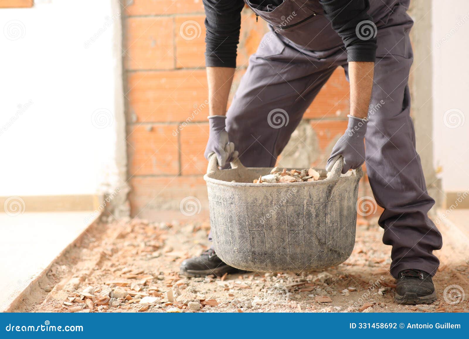 Construction Worker Lifting Work Carrycot Stock Photo - Image of ...