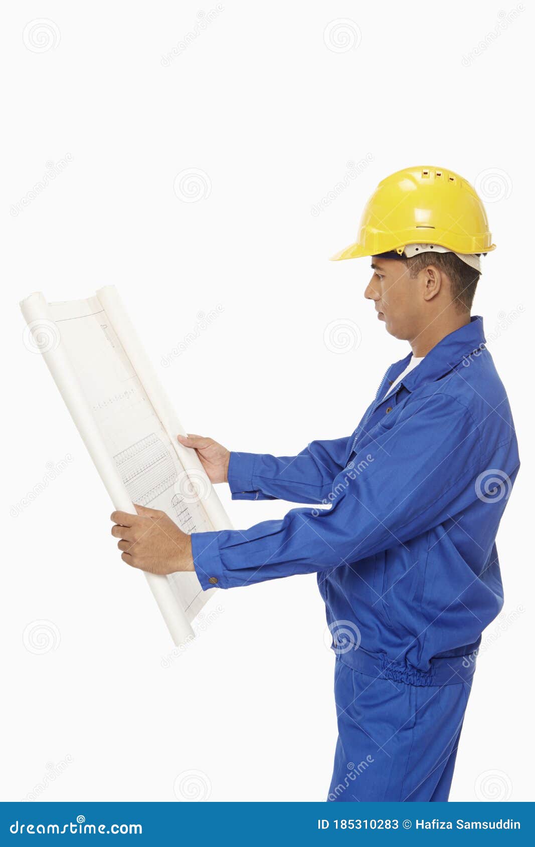 Construction Worker Looking at a Blueprint Plan Stock Image - Image of ...