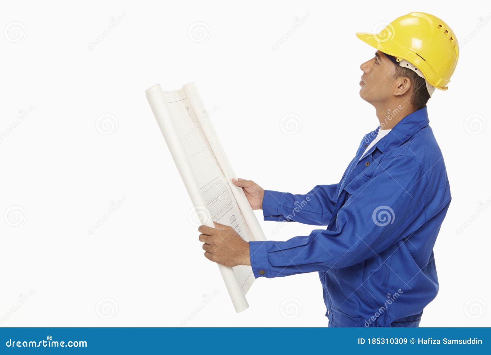 Construction Worker Looking at a Blueprint Plan Stock Image - Image of ...