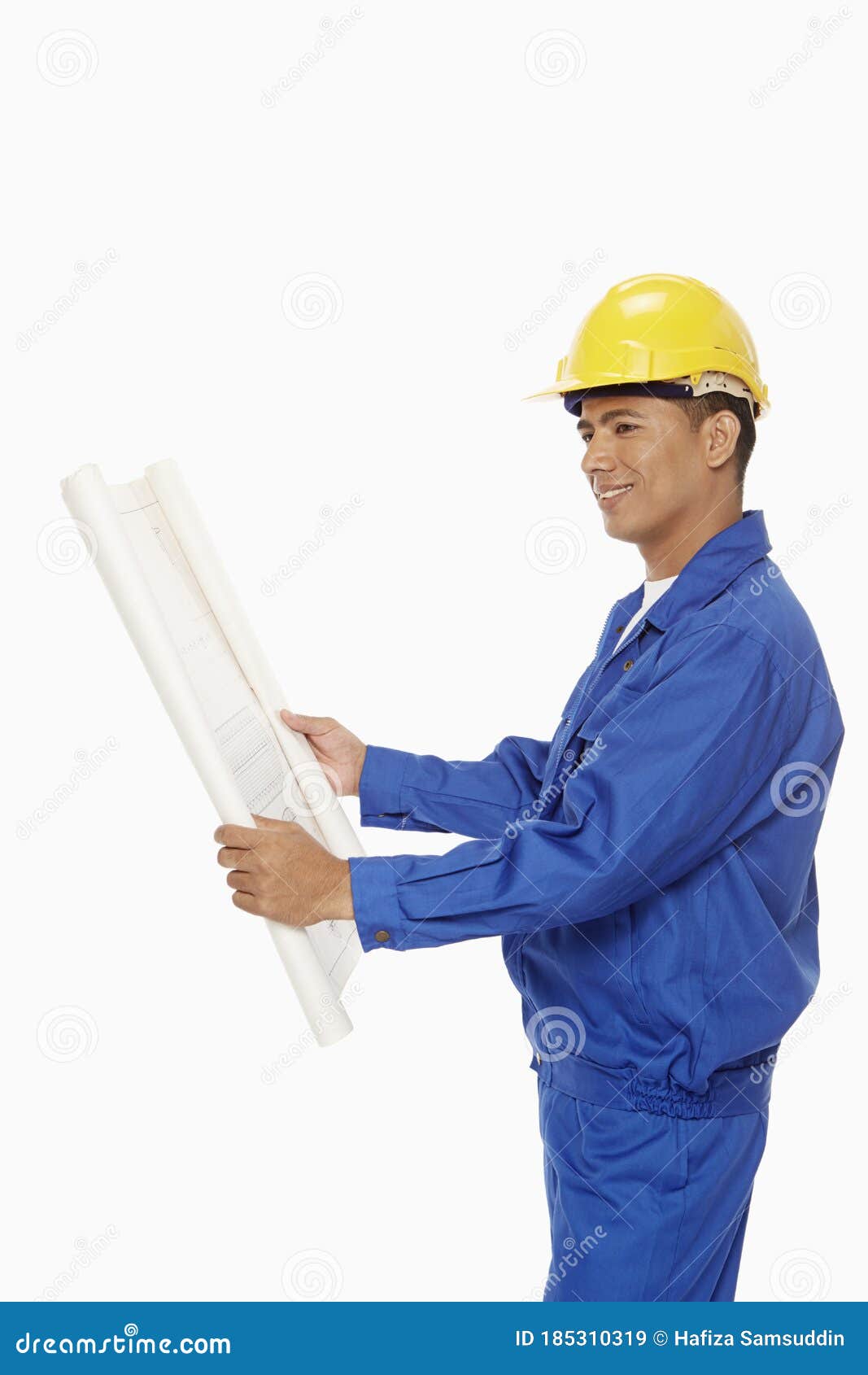 Construction Worker Looking at a Blueprint Plan Stock Image - Image of ...