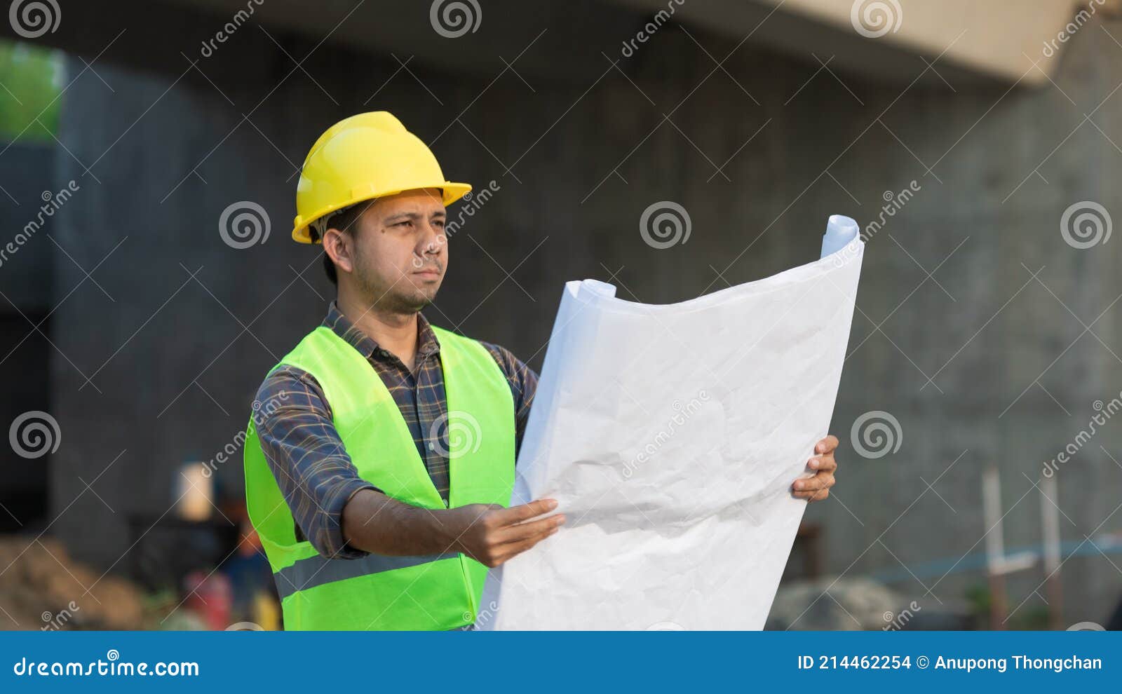 Construction Worker Looking Plans on Blueprint Stock Photo - Image of ...