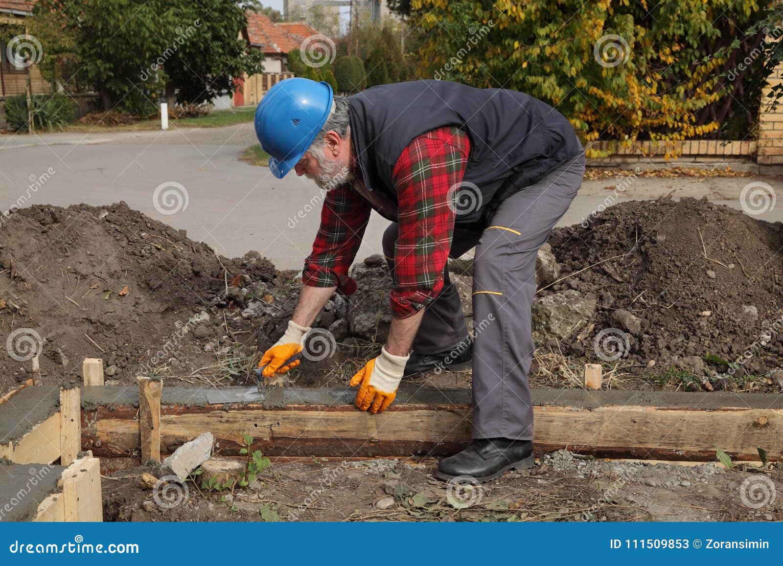 Construction Worker Making Concrete Foundation in Formwork Stock Image ...