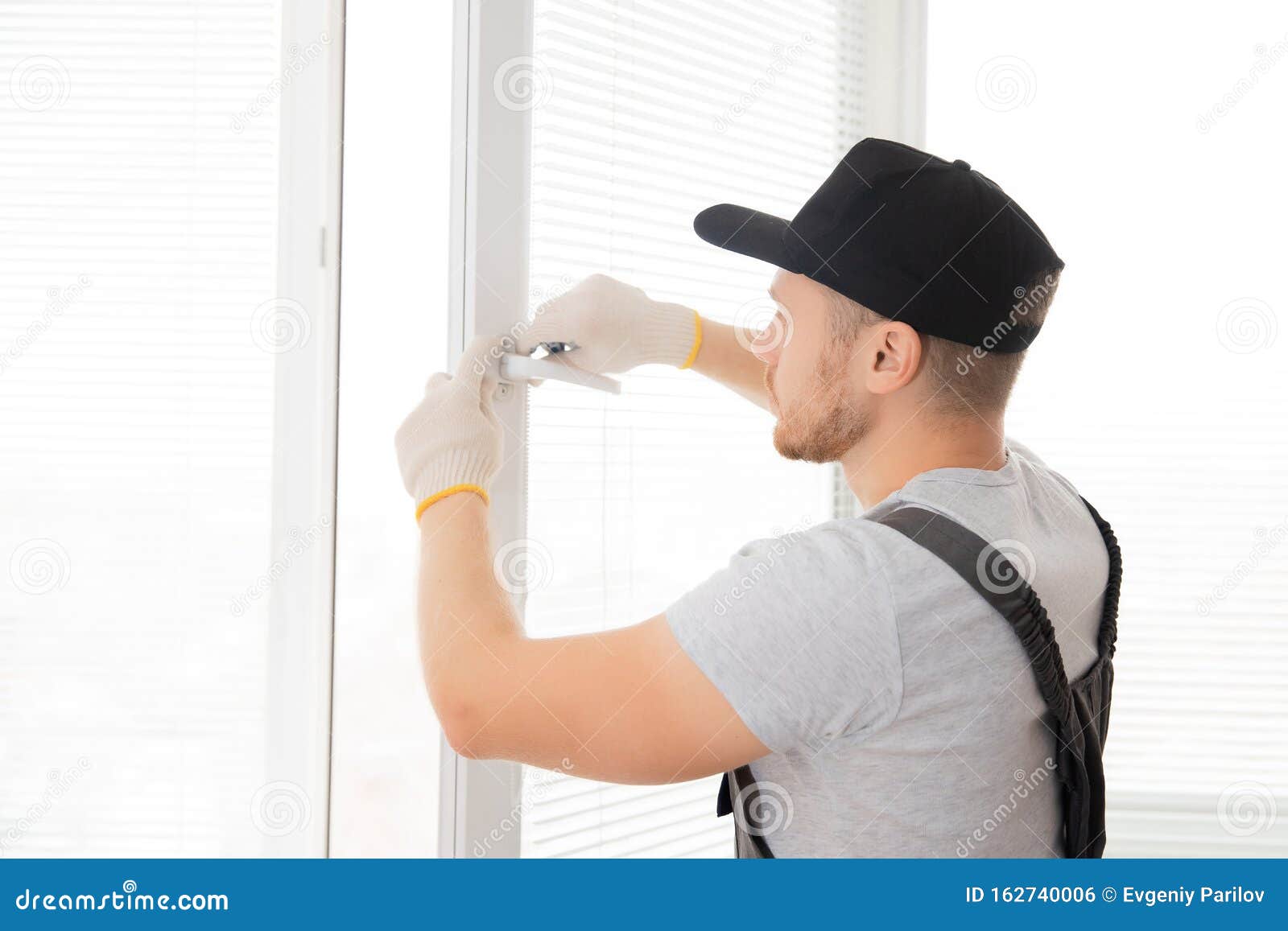 Construction Worker Man Install Plastic White Upvc Windows in House ...
