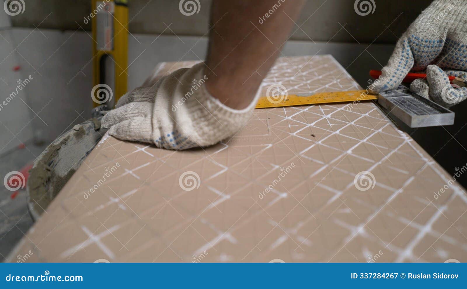 Construction Worker Measuring Ceramic Tile Using Ruler and Pencil Stock ...
