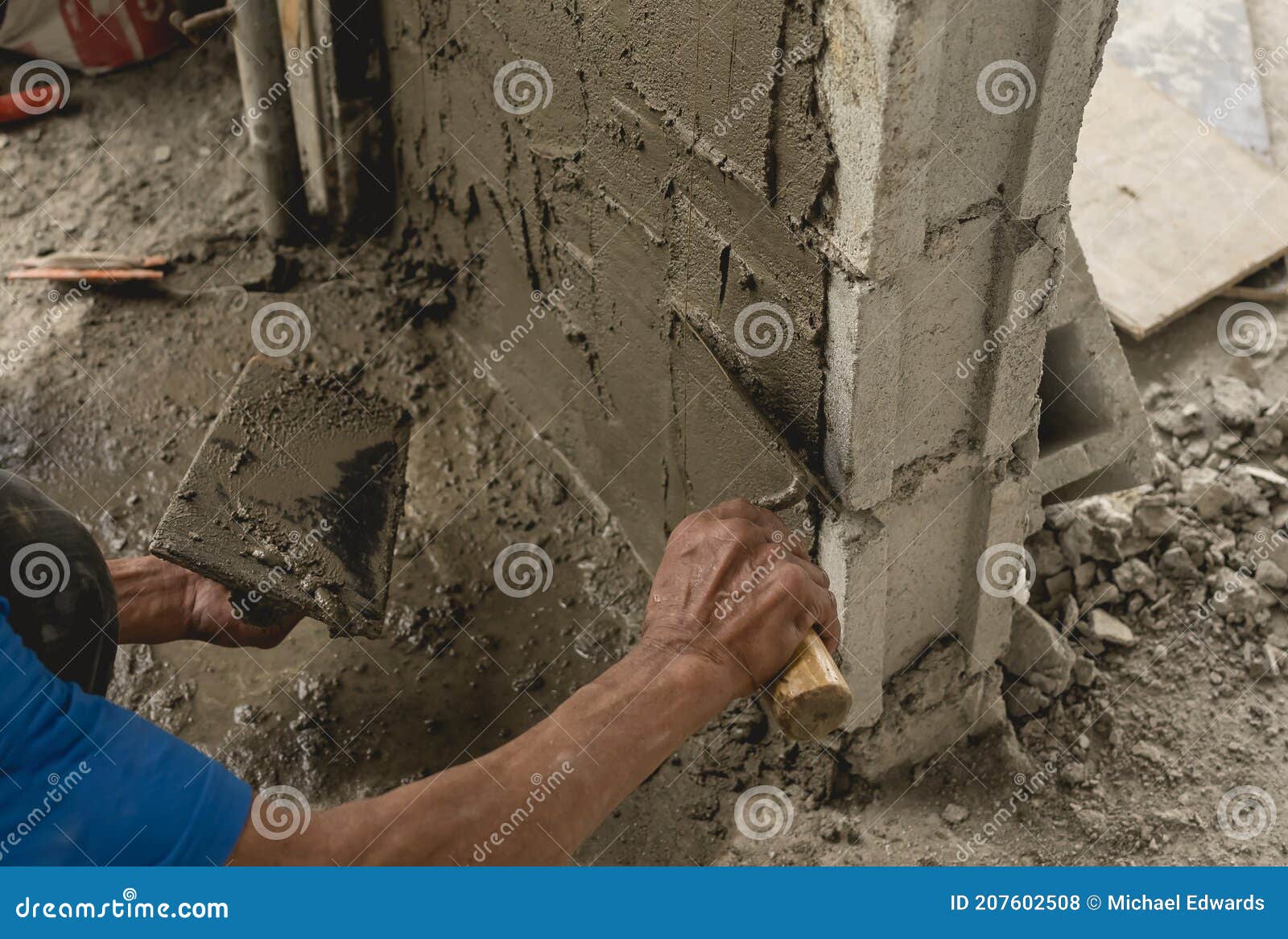 A Construction Worker or Mason Smooths Out Wet Concrete Placed on Top ...