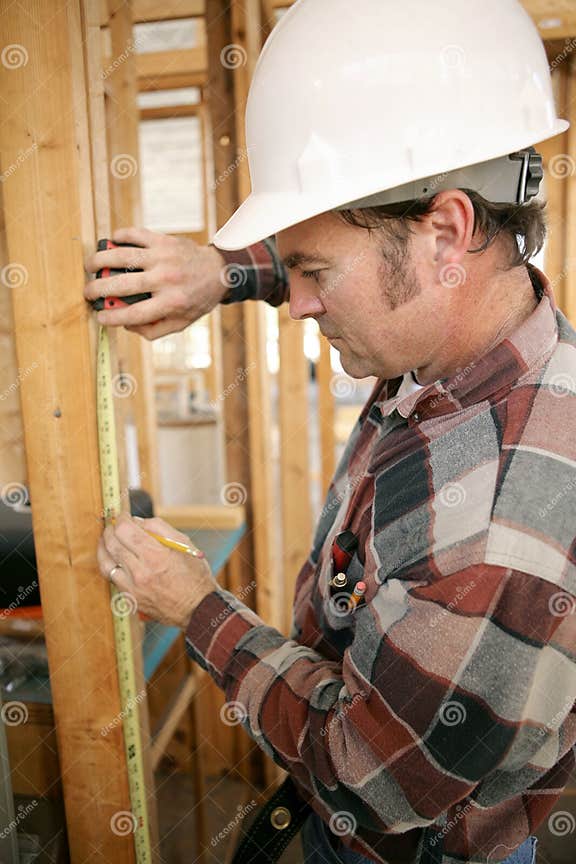 Construction Worker Measuring Stock Image - Image of remodel, measure ...