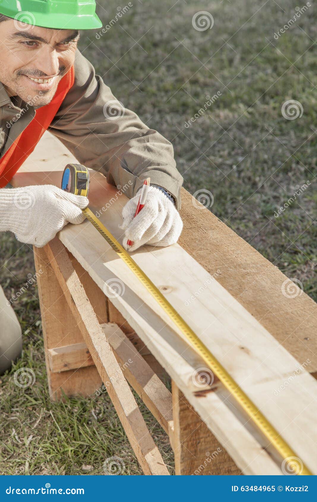 Construction Worker Measuring a Cut Stock Image - Image of work ...