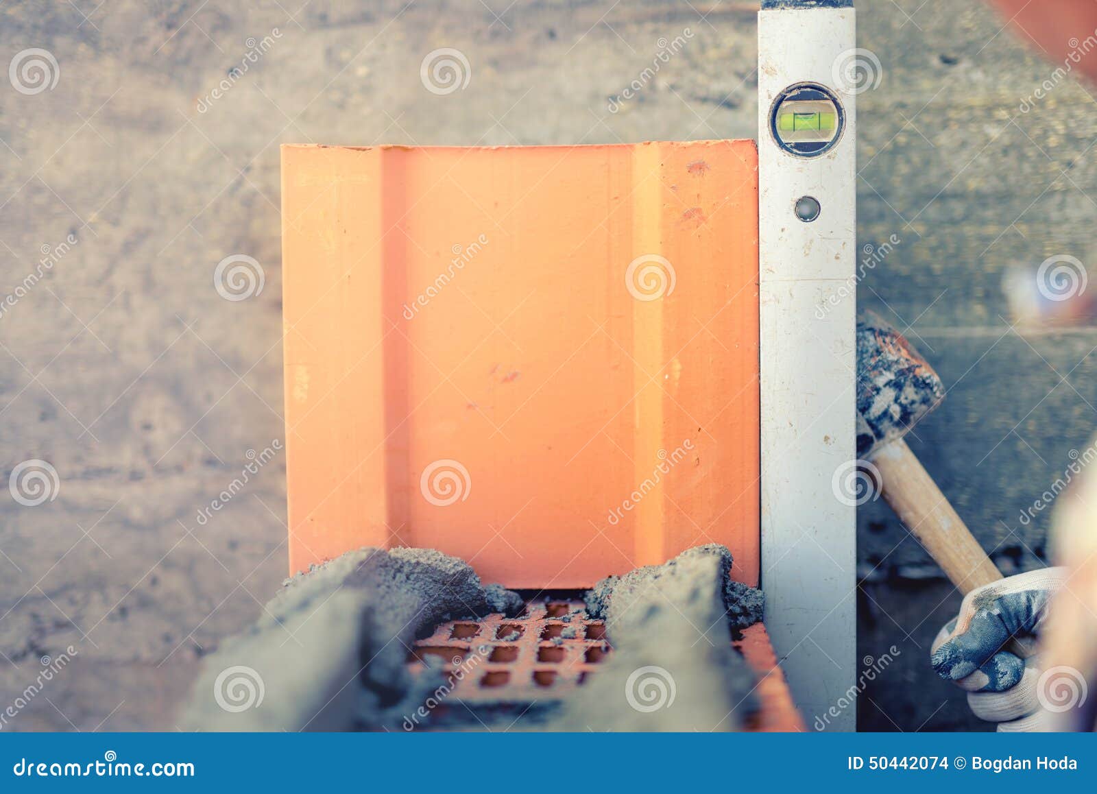 Construction Worker Measuring with Professional Level Bricks on Walls ...