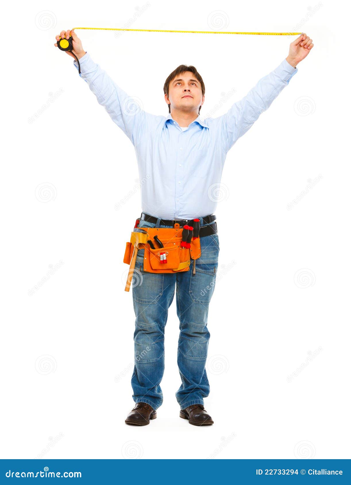 Construction Worker Measuring with Ruler Stock Photo - Image of ...