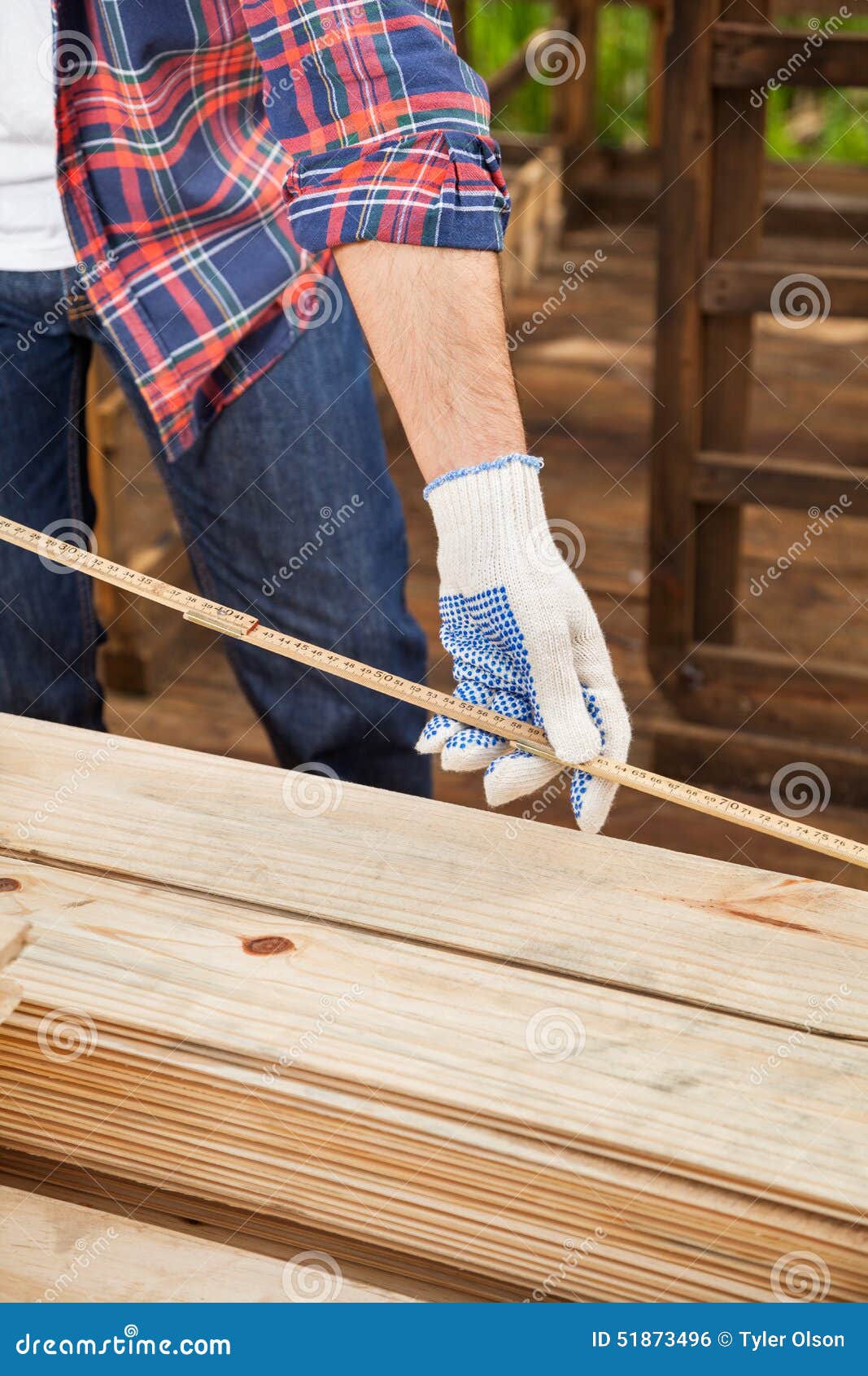 Construction Worker Measuring Timber with Tape Stock Photo - Image of ...
