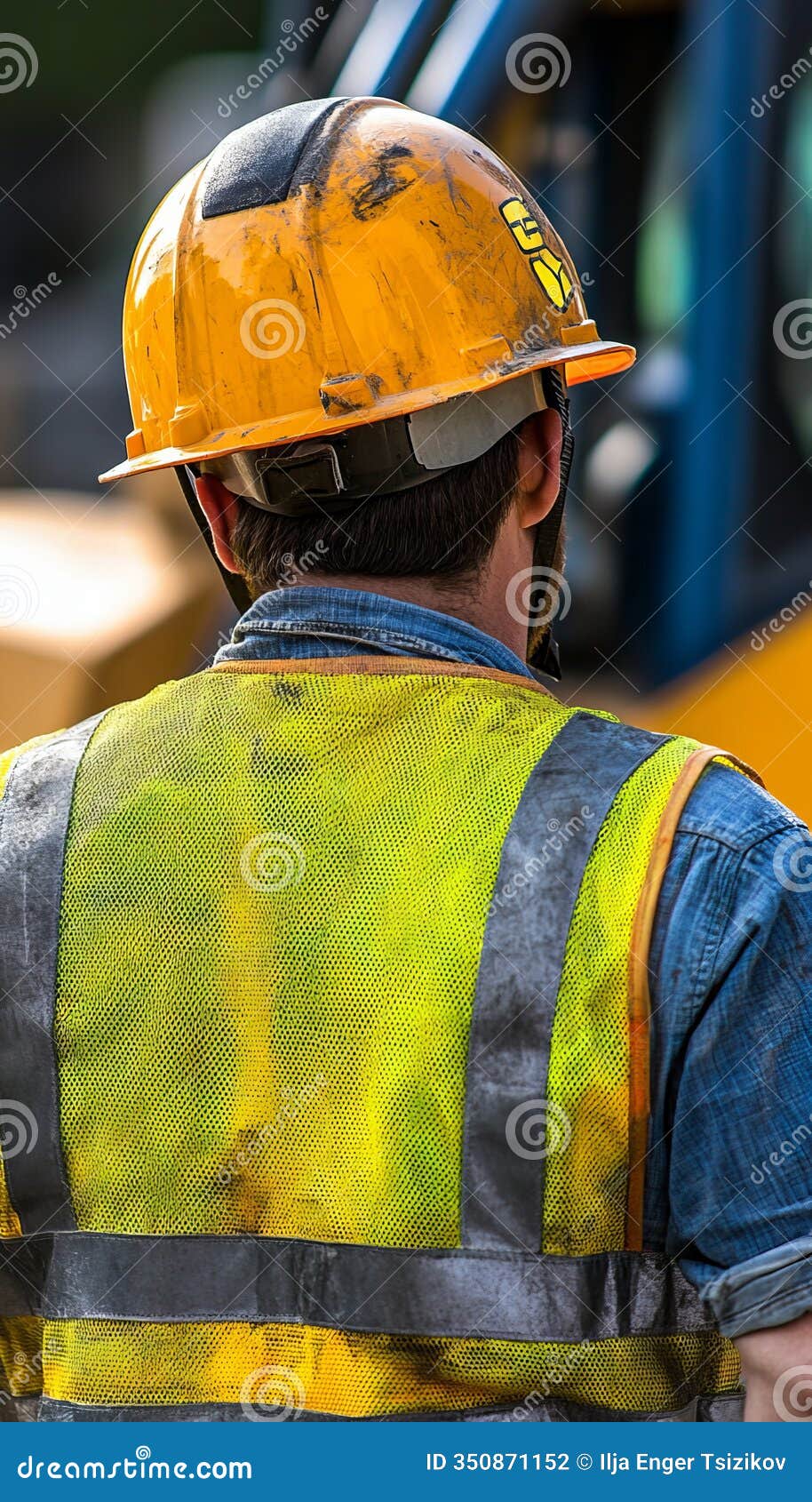 Construction Worker Observes Project, Highlighting Workplace Safety ...