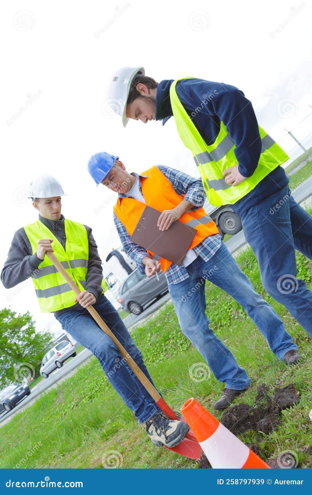 Construction Worker with One Leg on Shovel Driven into Ground Stock ...