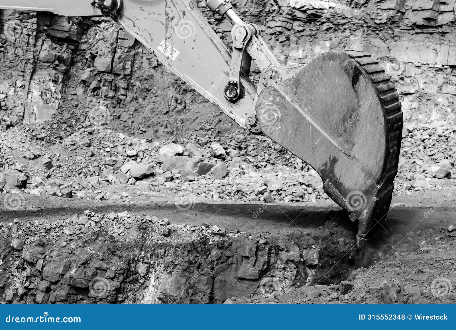 Construction Worker Operates a Digger on a Loader at a Job Site ...