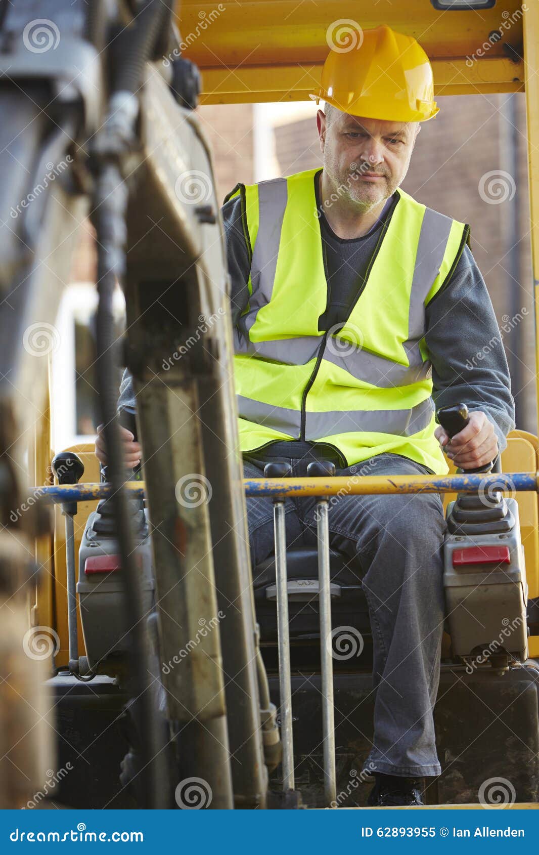Construction Worker Operating Digger on Site Stock Image - Image of ...