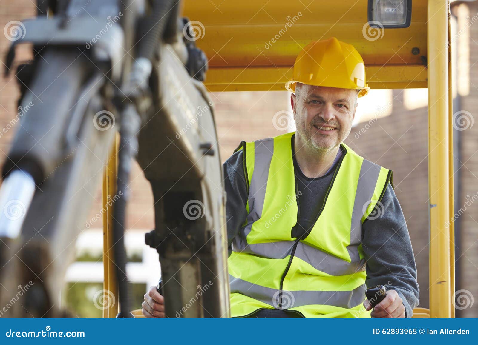 Construction Worker Operating Digger on Site Stock Image - Image of ...