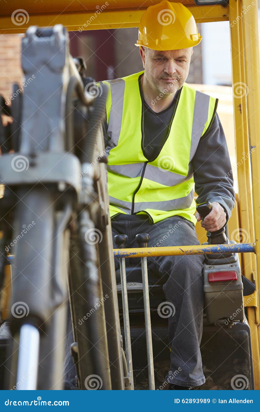 Construction Worker Operating Digger on Site Stock Image - Image of ...