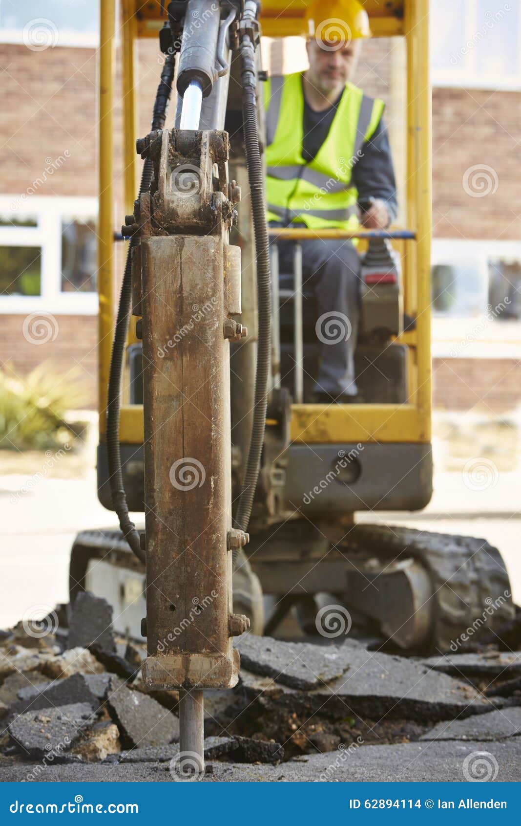 Construction Worker Operating Digger on Site Stock Photo - Image of ...
